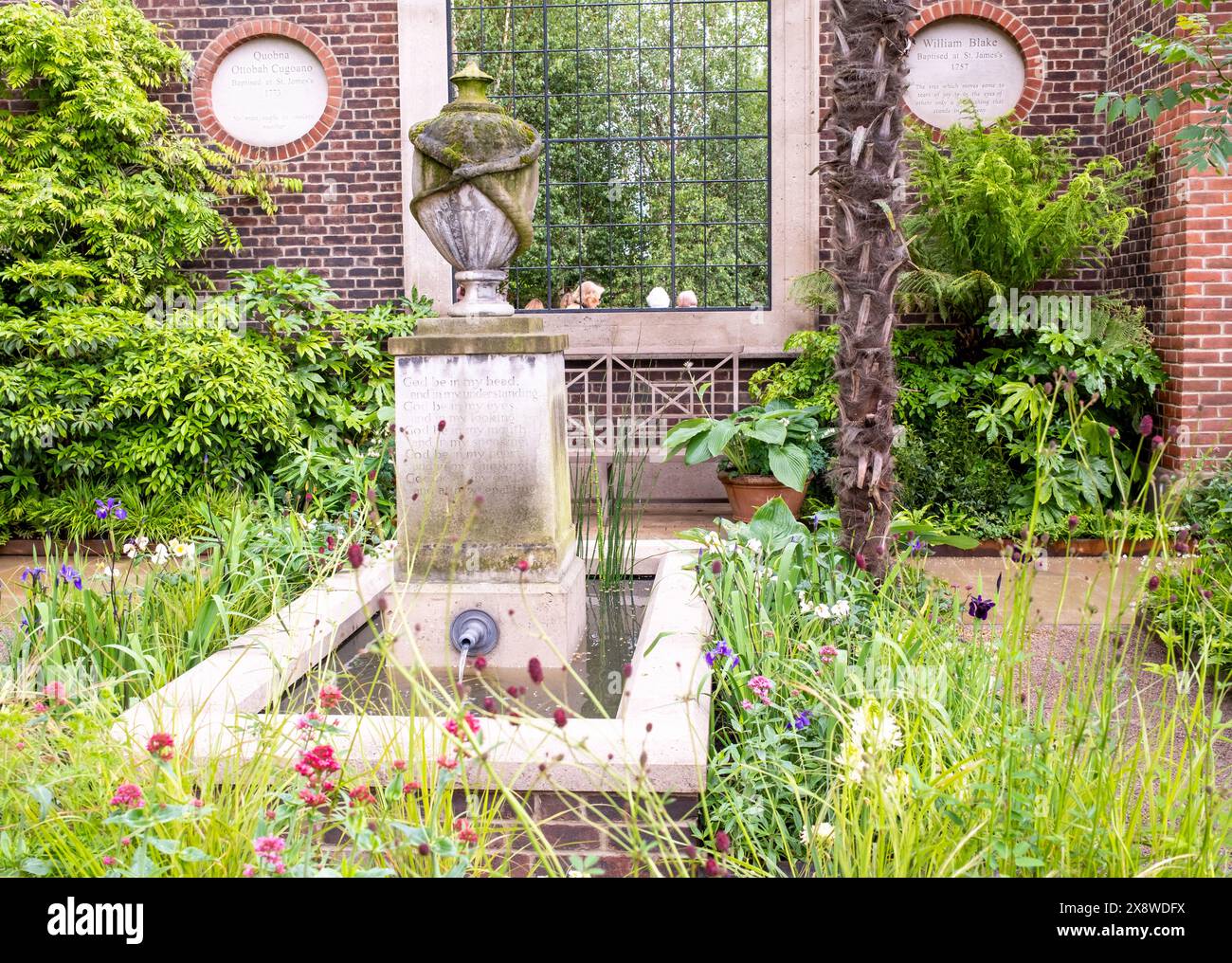 Ornate fountain and water feature in a display garden at the 2024 RHS ...