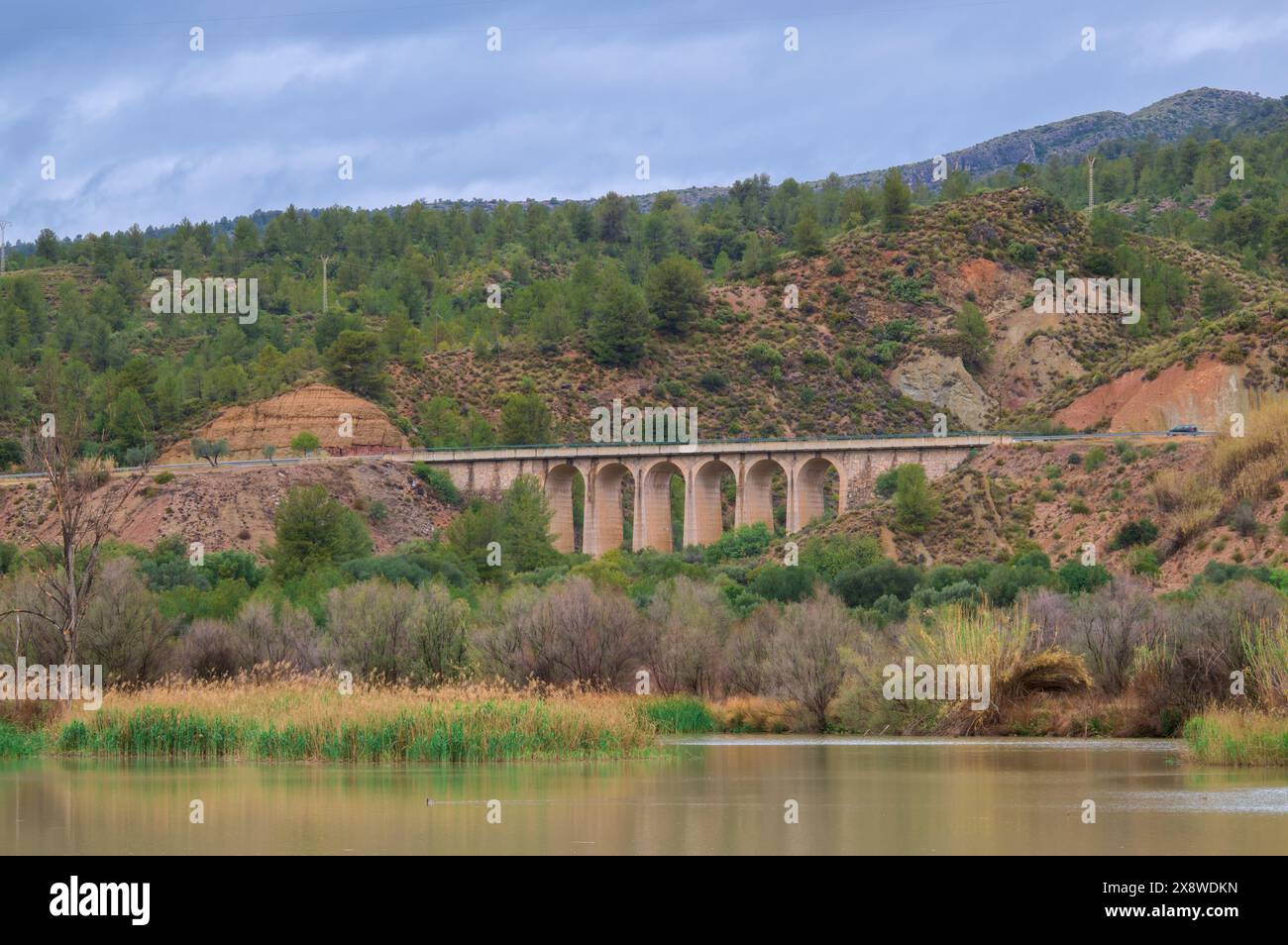 The image shows a scenic landscape featuring a bridge Stock Photo - Alamy