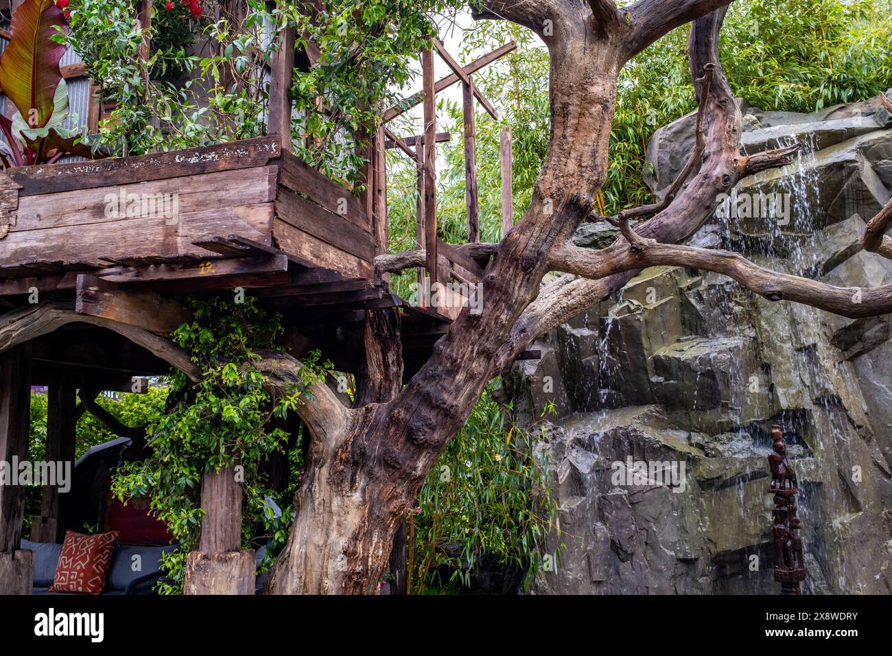Wooden tree house and water feature on display at the 2024 RHS Chelsea ...