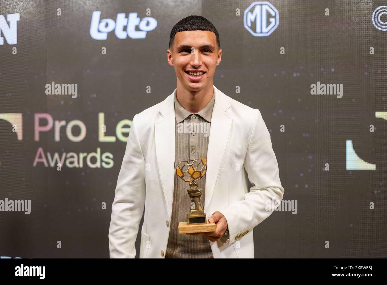 Middelkerke, Belgium. 27th May, 2024. Genk's Bilal El Khannouss poses with his trophy for best ...