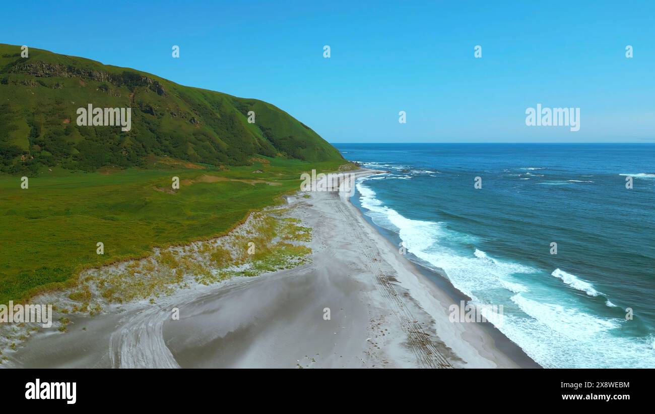 Breathtaking aerial view of the summer beach coastline. Clip. Wild ...