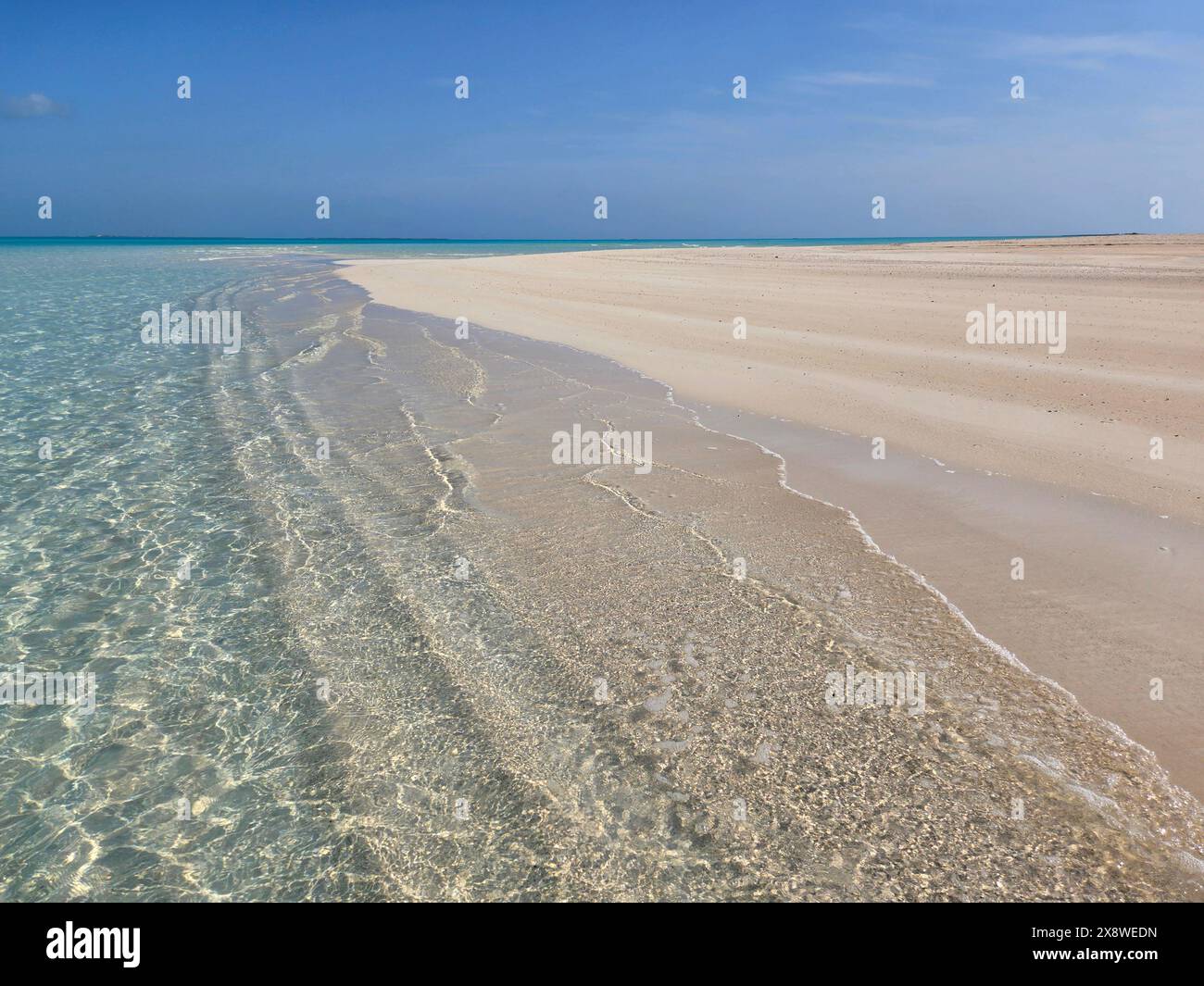 Sandbar and clear shallow water of Treasure Cay, Abaco, Bahamas on ...
