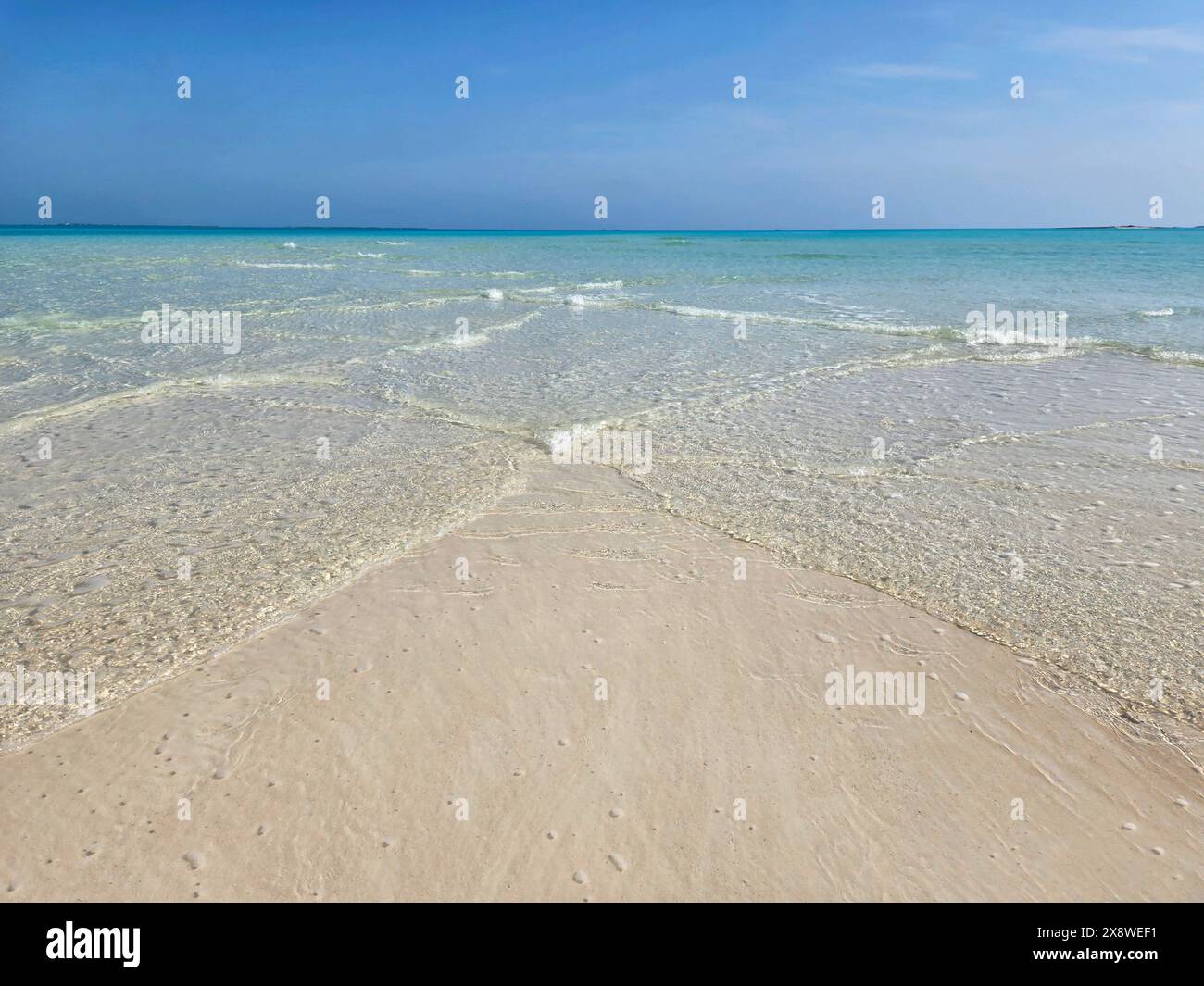 Sandbar and clear shallow water of Treasure Cay, Abaco, Bahamas on ...