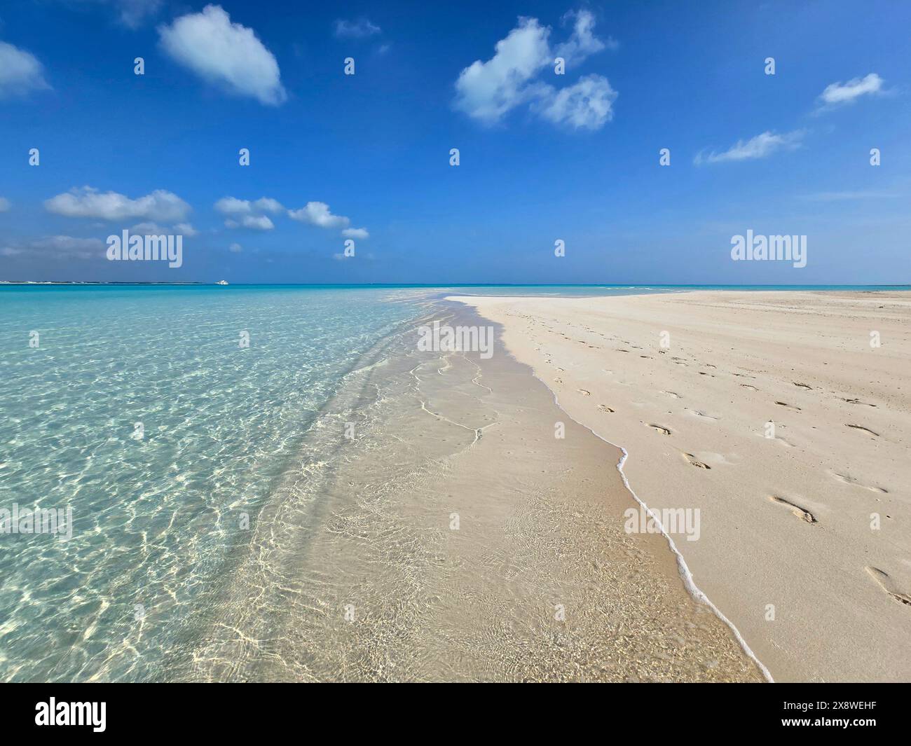 Sandbar and clear shallow water of Treasure Cay, Abaco, Bahamas on ...