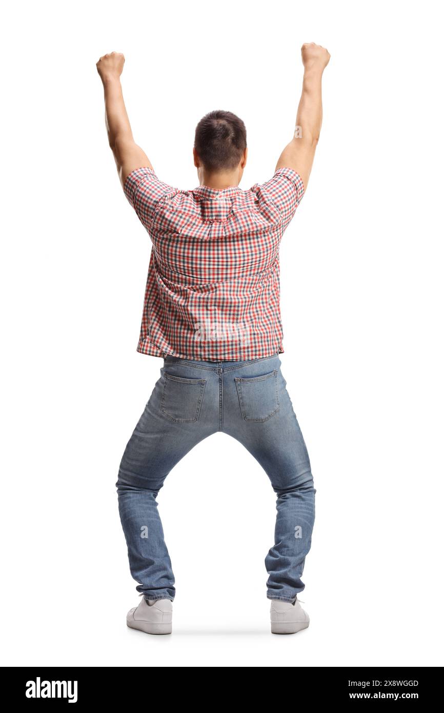 Rear view shot of a happy young man cheering with arms up isolated on ...