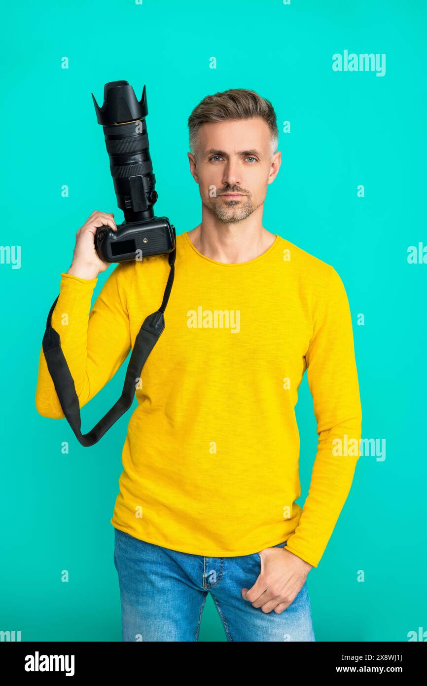 Professional photography. Shooting session. Photoshoot. Man taking ...