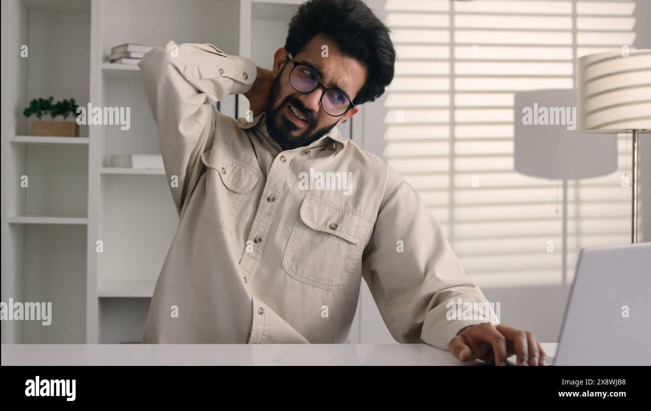 Tired man neck pain working hi-res stock photography and images - Alamy