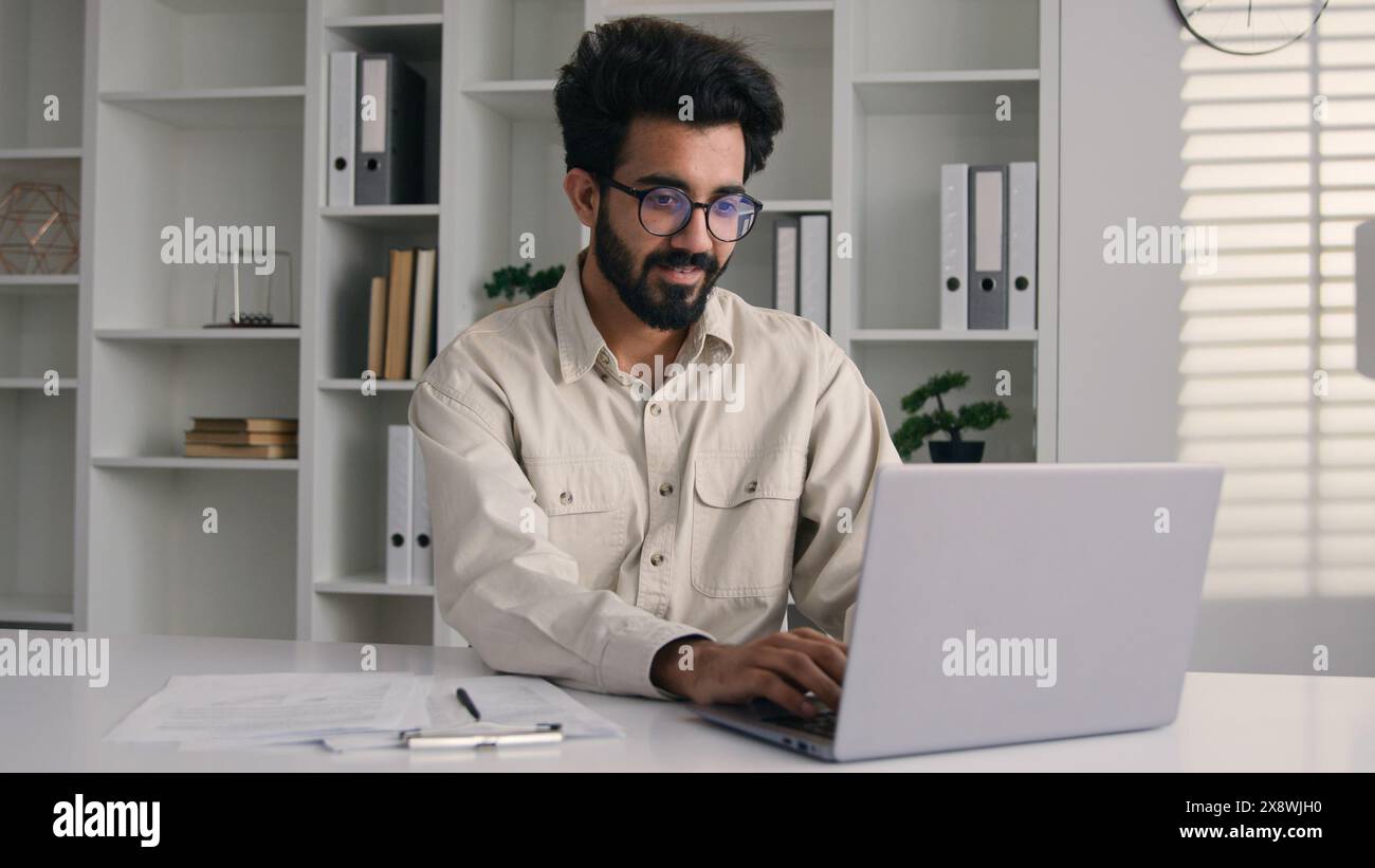 Indian male programmer standing hi-res stock photography and images - Alamy
