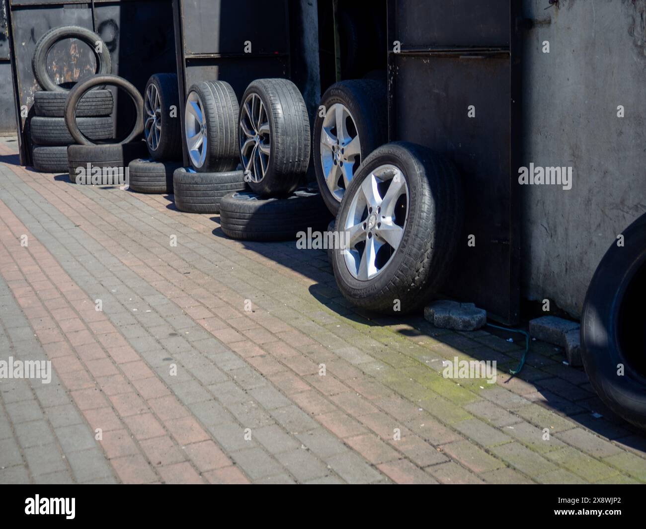 Old tire shop. Lots of tires from passenger cars. Private business ...