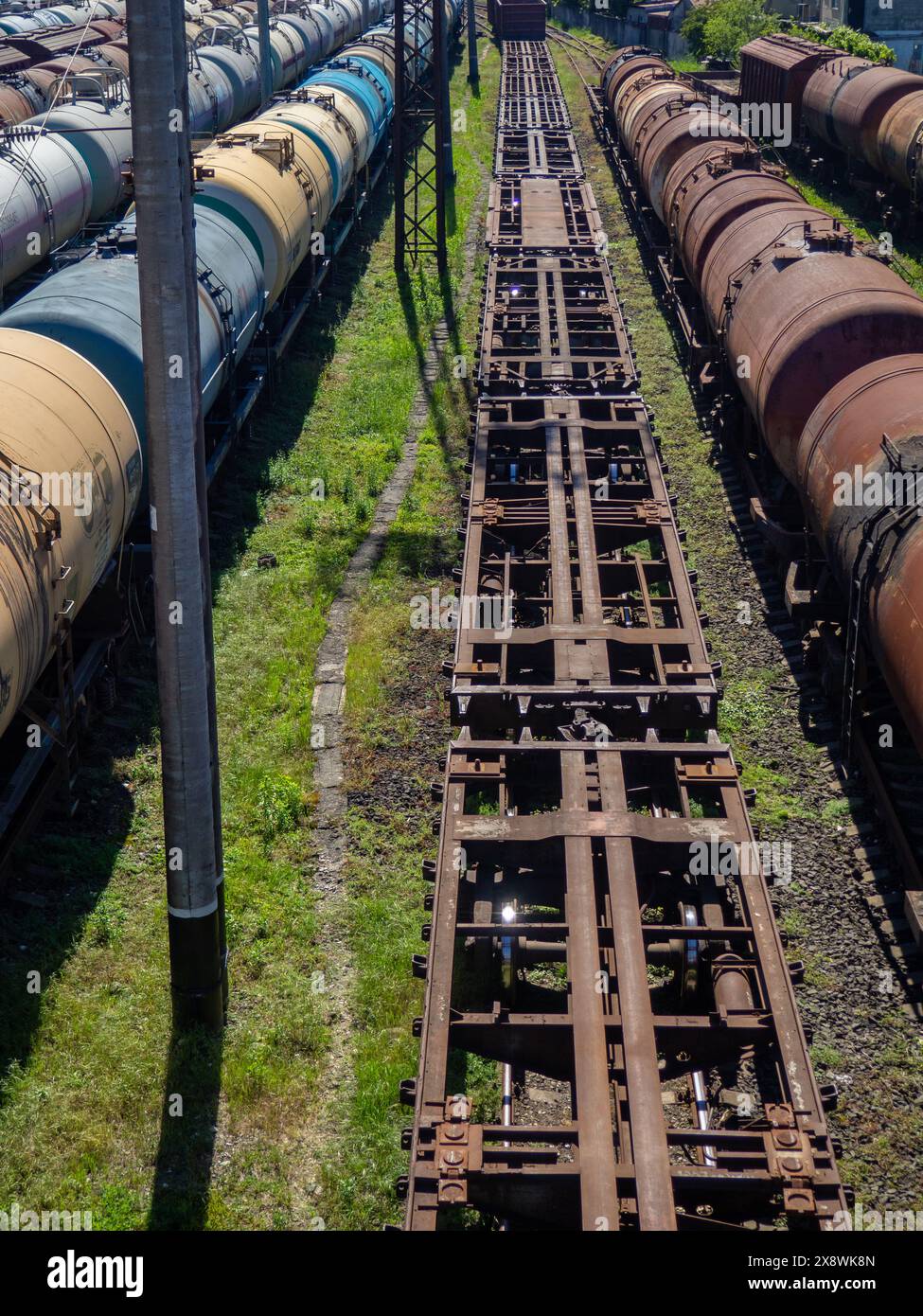 bases of railway cars on the tracks. Empty composition. A train without ...