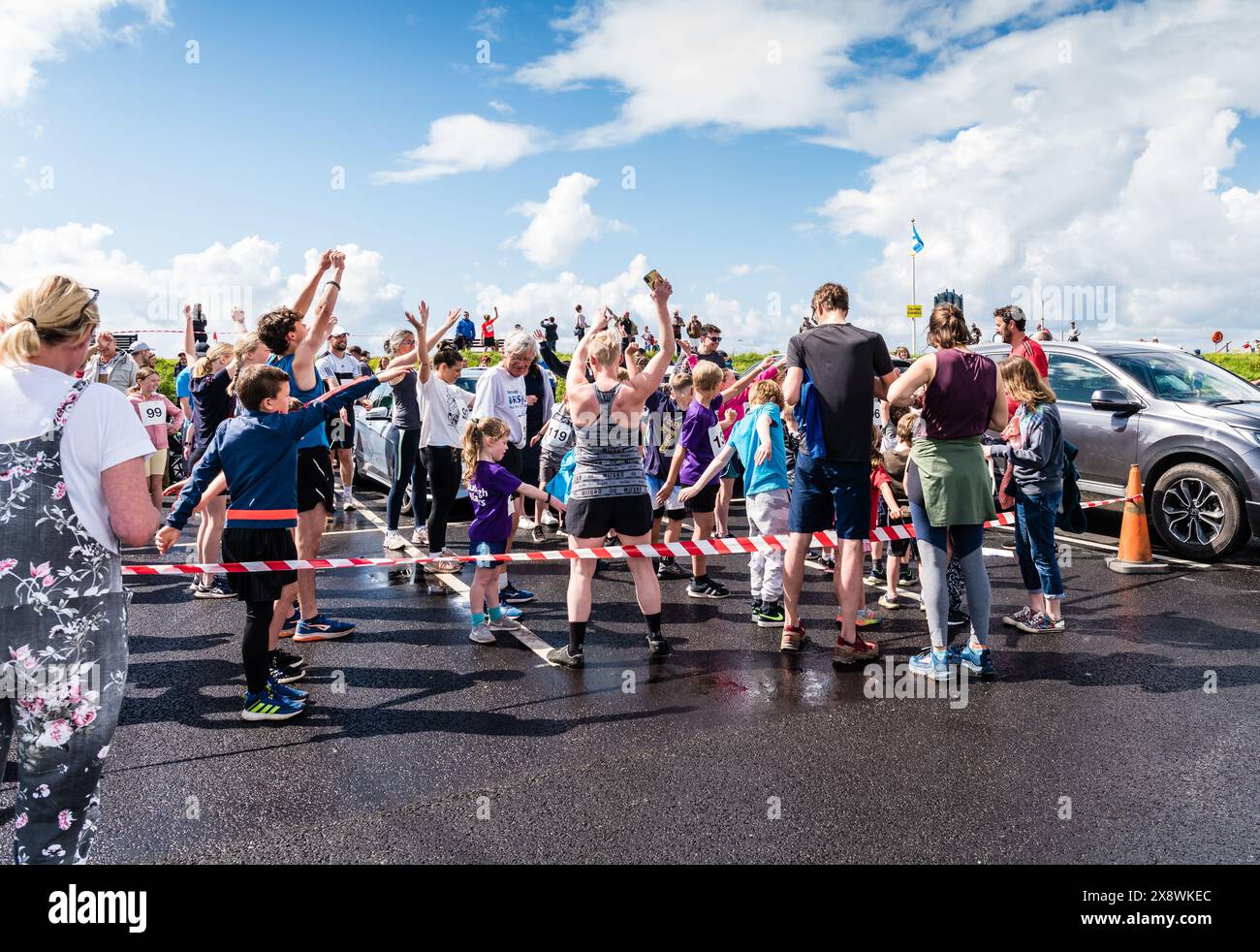 Budleigh Salterton Gala Week. Limbering up for the Pebbledash Fun Run ...