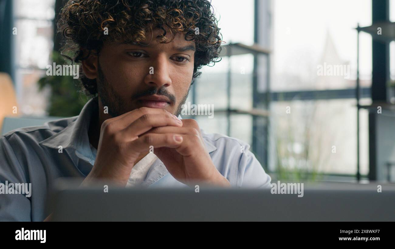 Pensive thoughtful Indian Arabian man male business person puzzled ...
