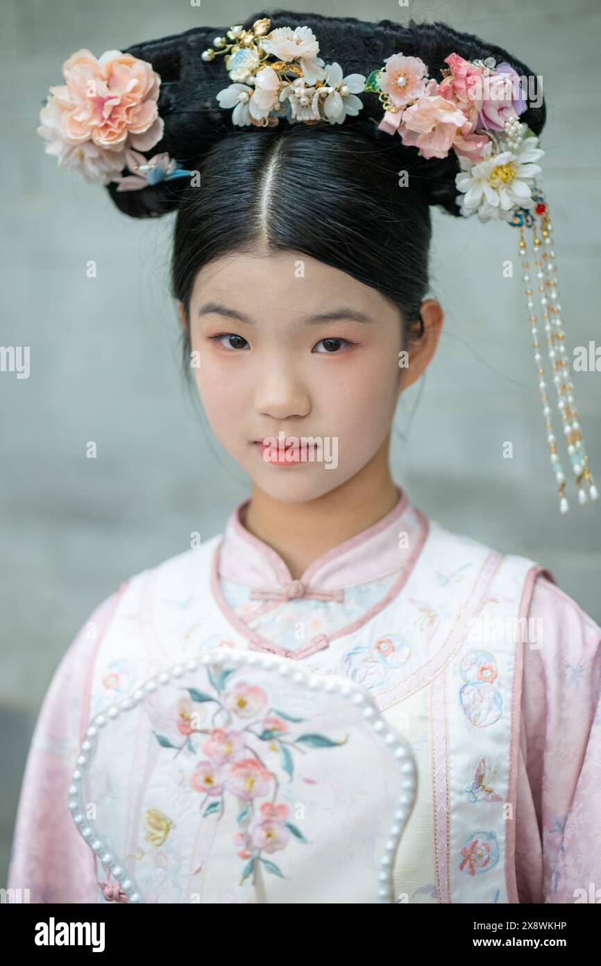 Portrait of young beautiful Chinese teenage girl in Beijing, China ...