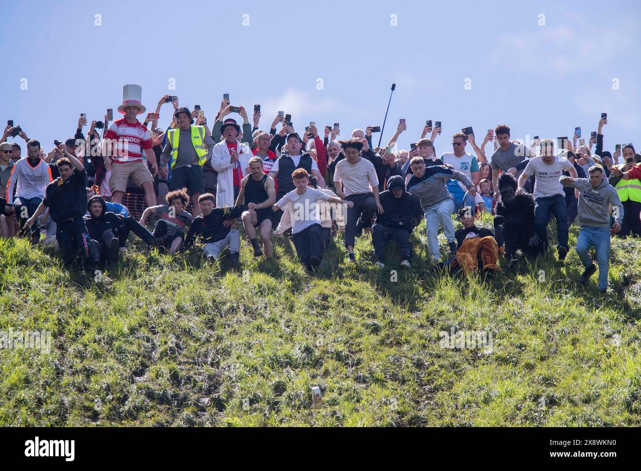 The second race starts at the 2024 Cooper’s Hill Cheese Rolling event ...