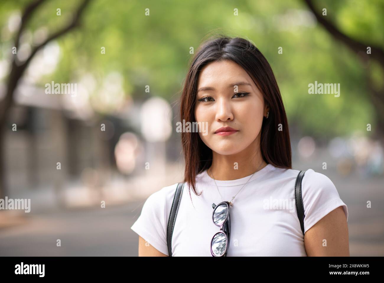 Street portrait of young beautiful Chinese teenage girl in the streets ...