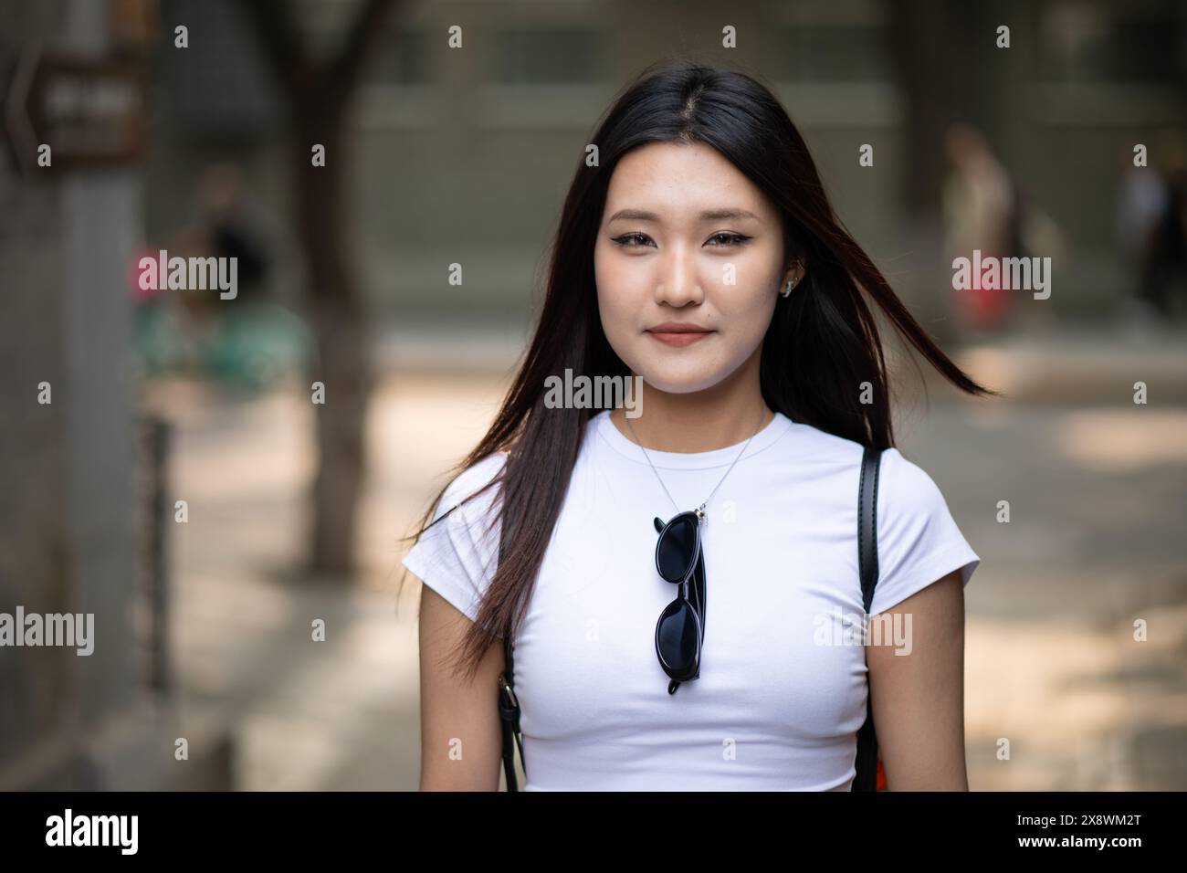 Street portrait of young beautiful Chinese teenage girl in the streets ...