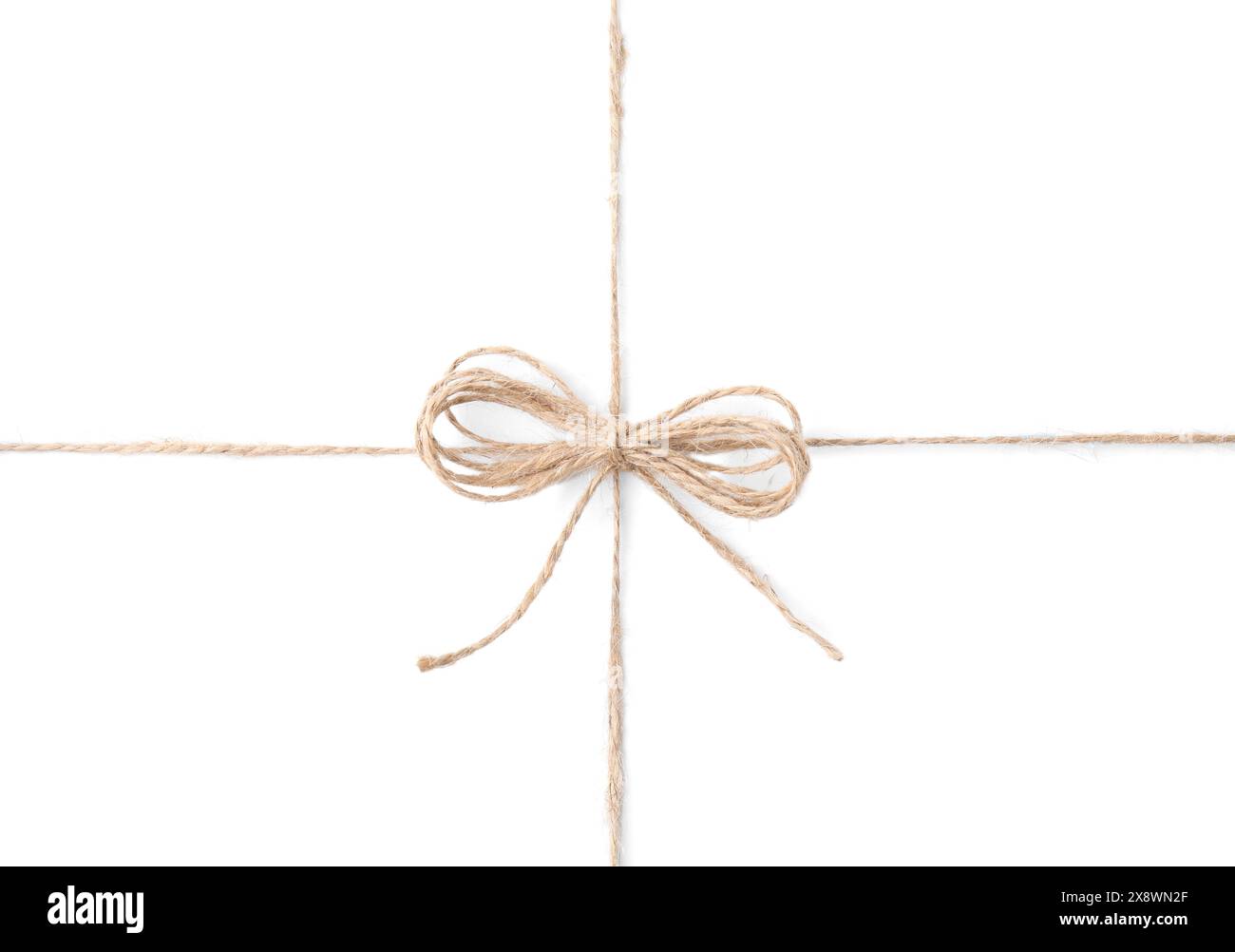 Linen rope string with bow isolated on white, top view Stock Photo - Alamy