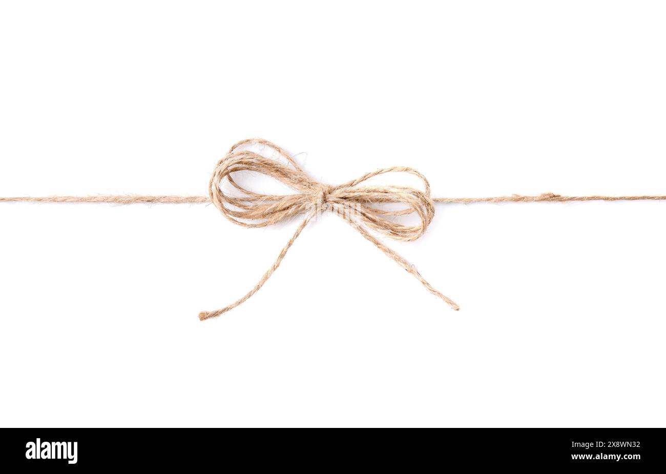 Linen rope string with bow isolated on white, top view Stock Photo - Alamy