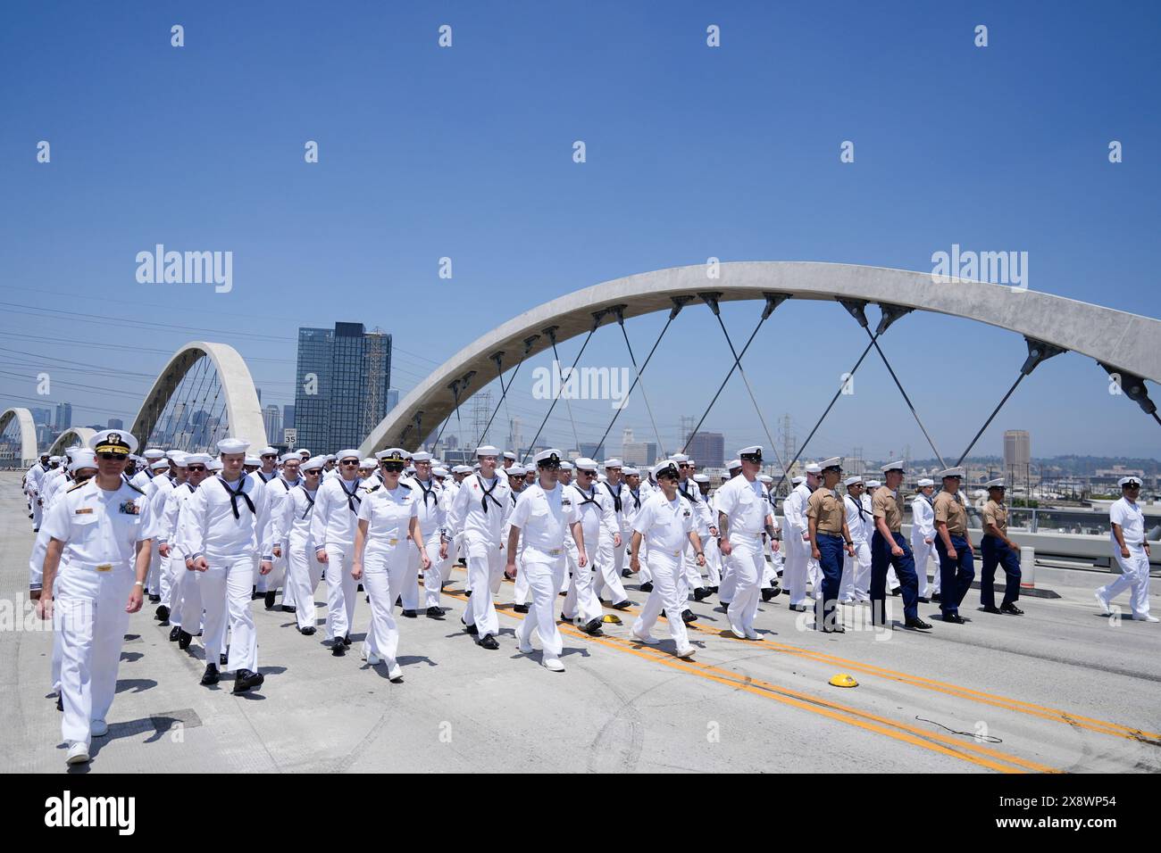 Sailors of the USS Carl Vinson walk across the Sixth Street Viaduct ...