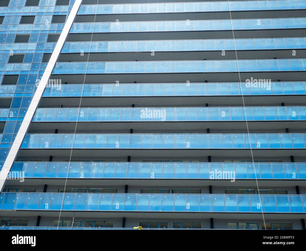 Multi-storey building concept. Background from the windows of the house ...