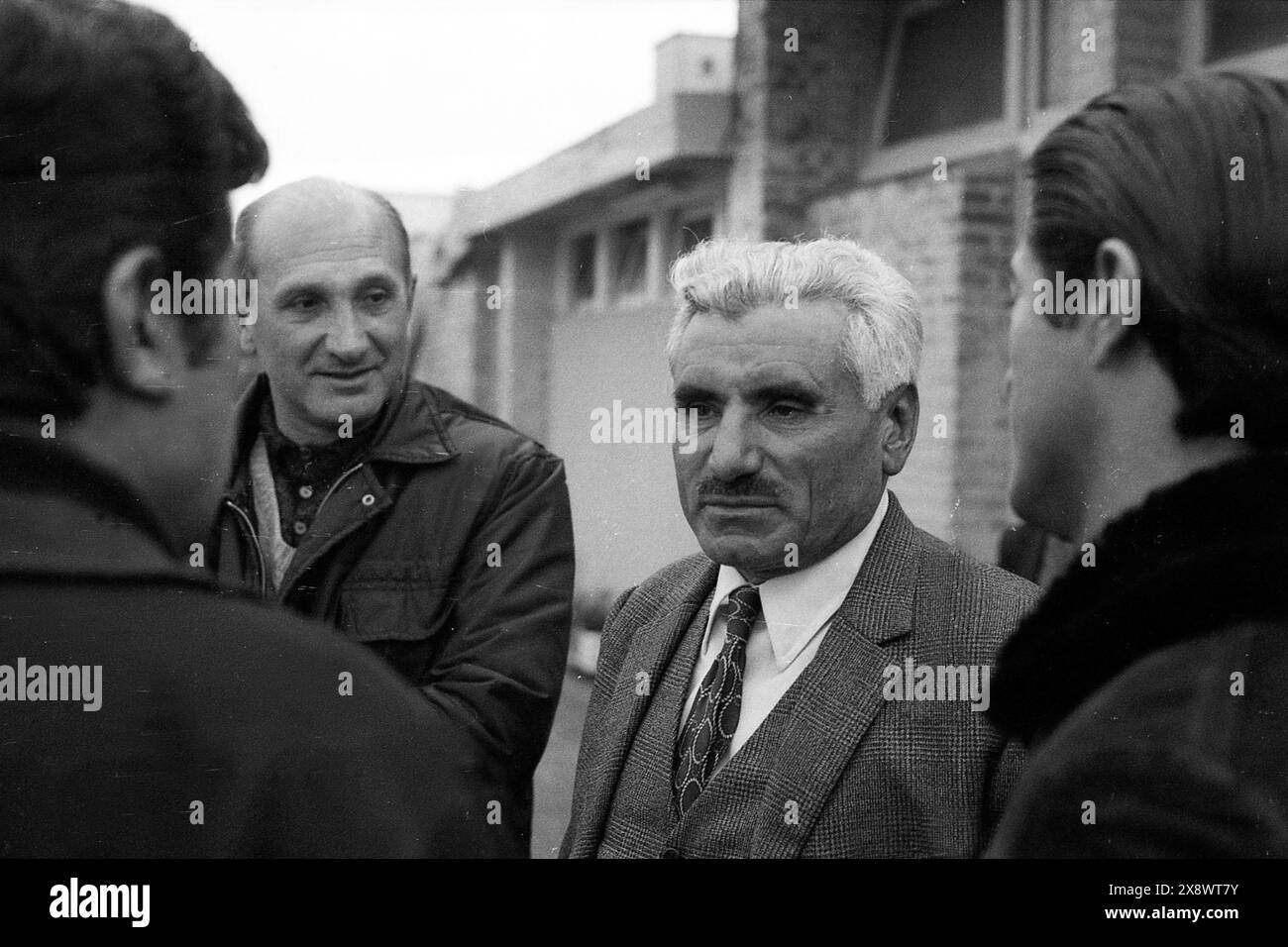 Argentine athlete Delfo Cabrera chats with friends, Buenos Aires, 1970s ...