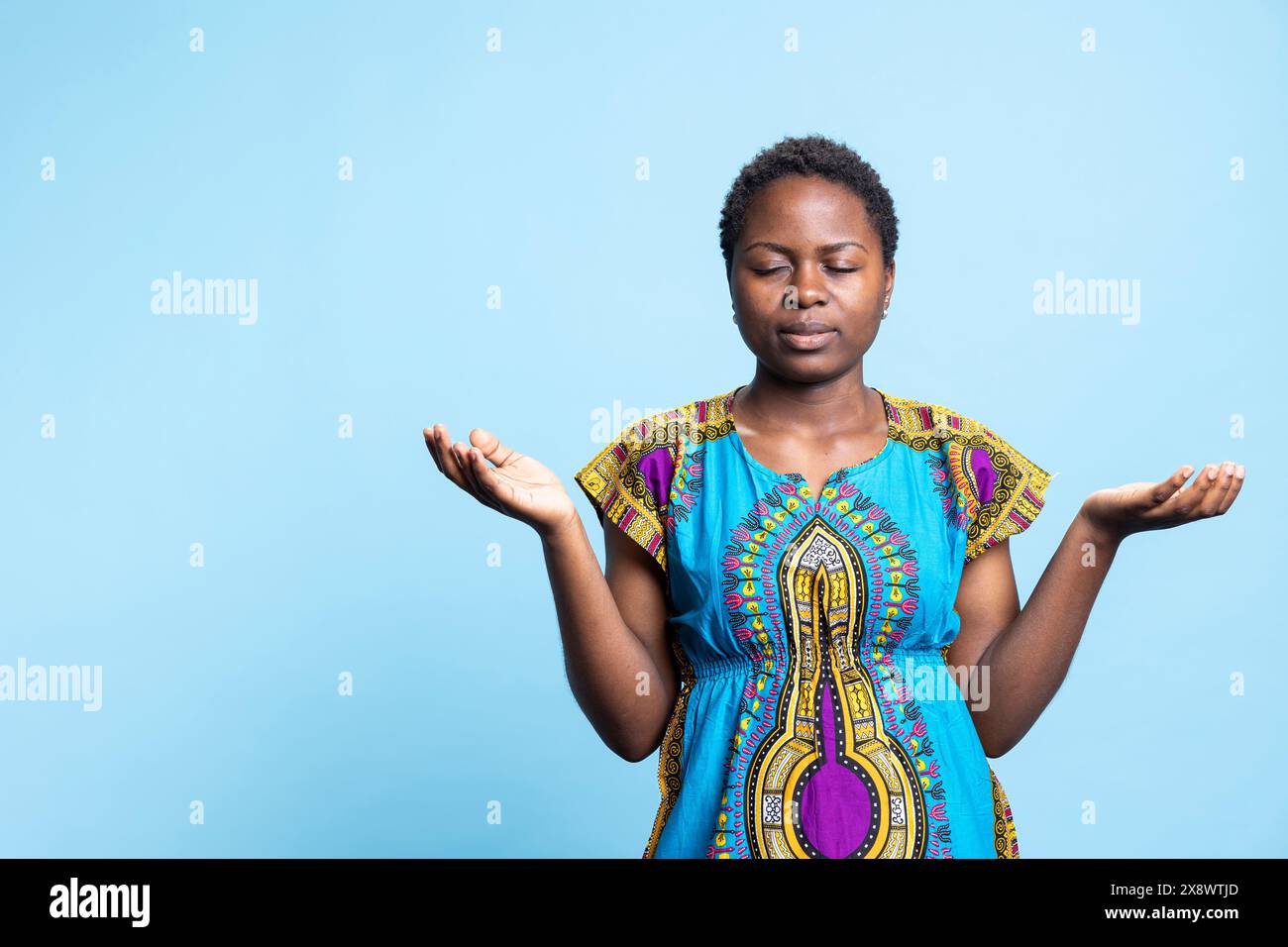 Female model praying to Jesus Christ for a miracle, expressing her ...