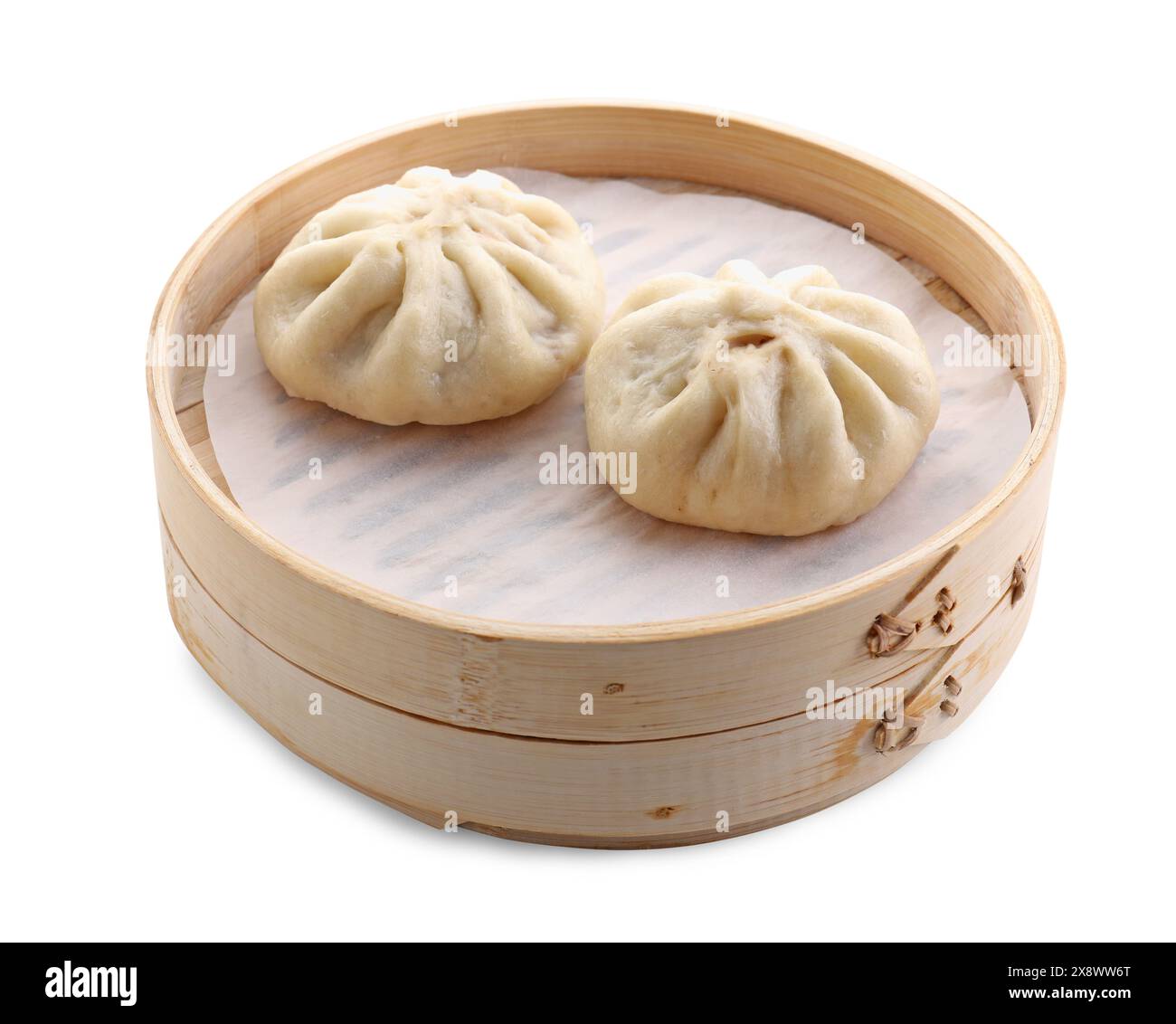 Delicious bao buns (baozi) in bamboo steamer isolated on white Stock ...