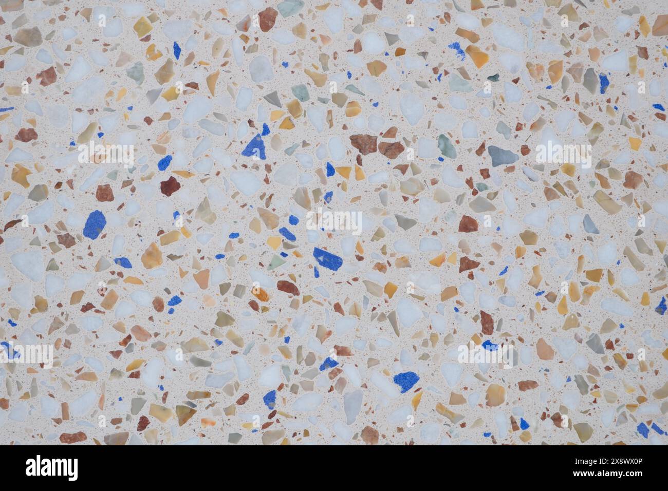 A mosaic tile floor with a variety of colors and textures. The tiles ...