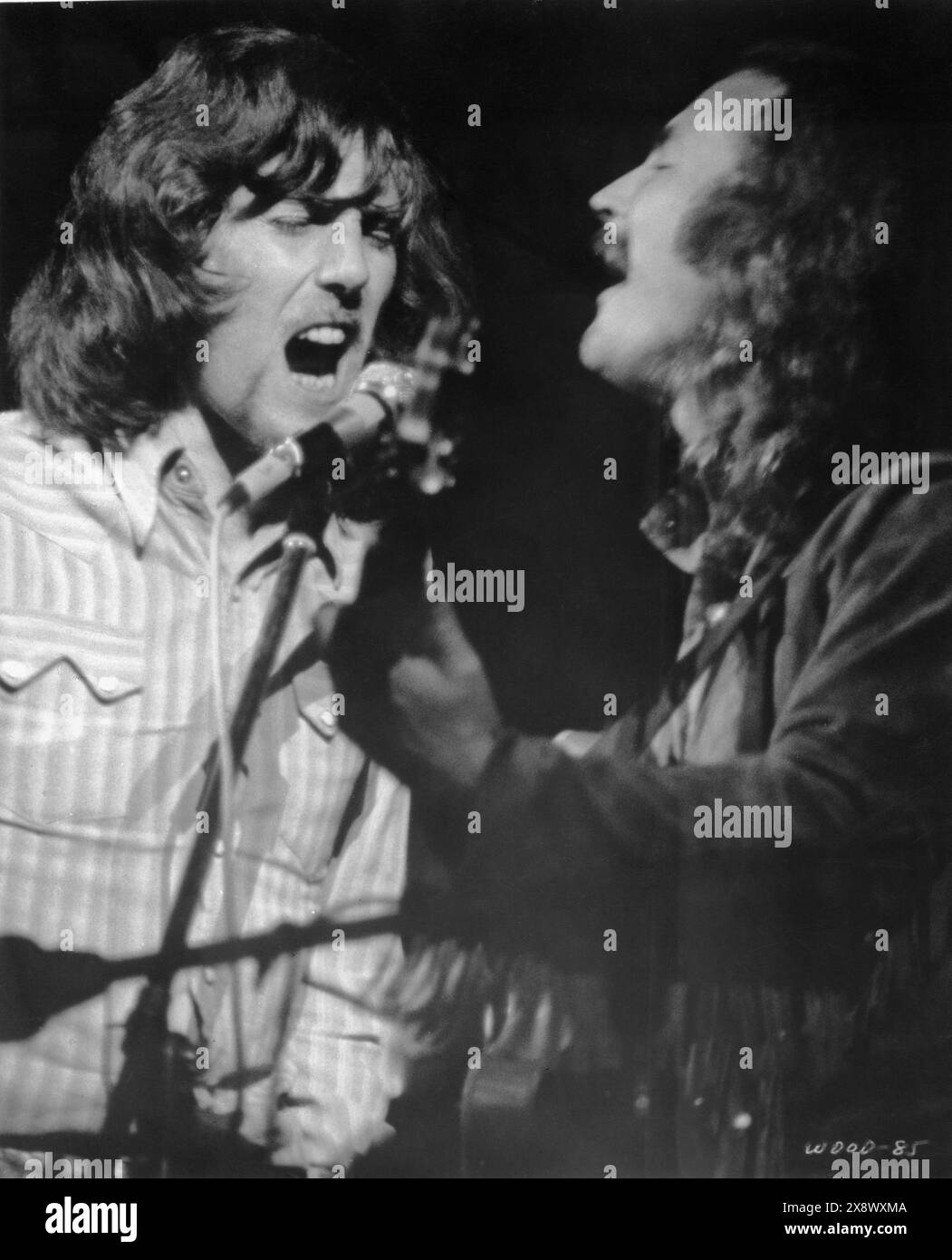 George Harrison and David Crosby singing at Woodstock Stock Photo - Alamy