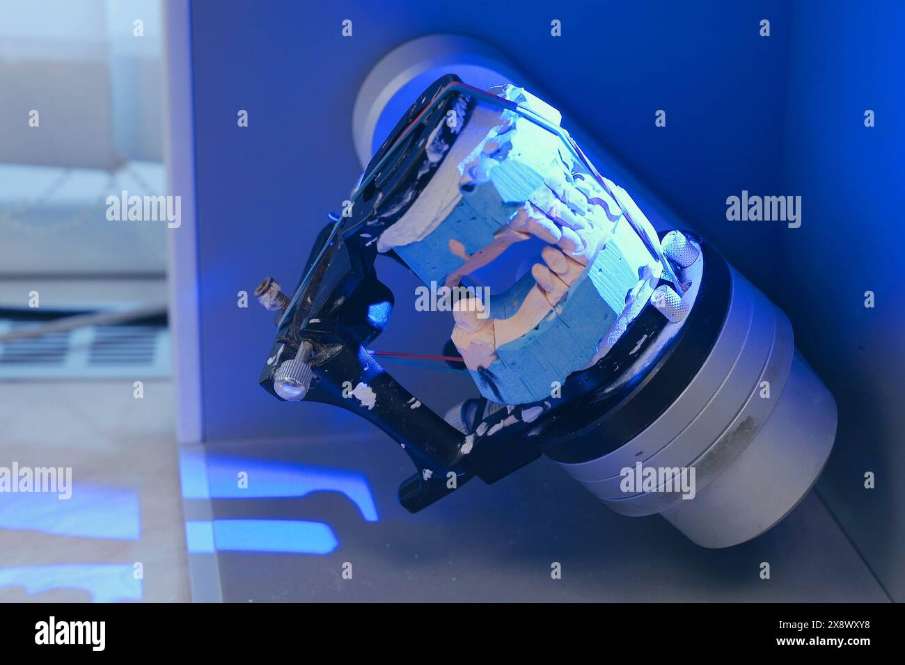 Scanning a denture in a dental laboratory to reproduce the patient's ...