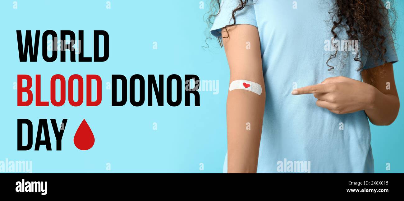 Female blood donor pointing at applied medical patch on her hand. World ...