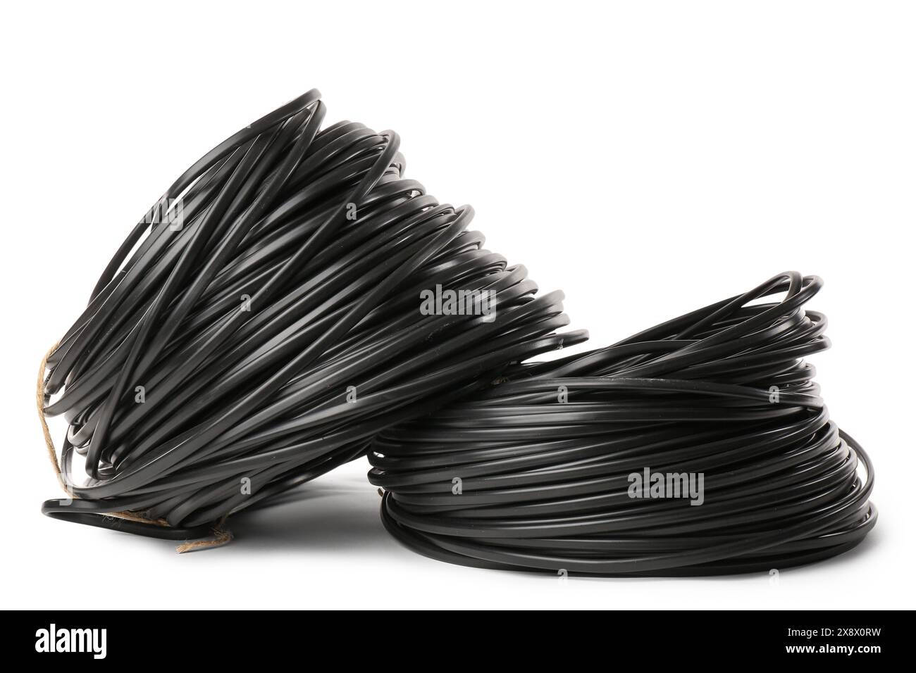 Rolled cables on white background Stock Photo - Alamy