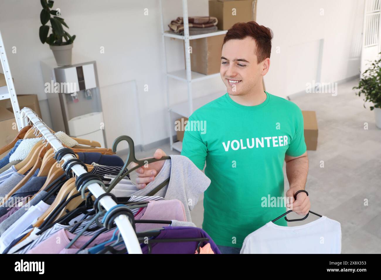 Person donating goods hi-res stock photography and images - Alamy