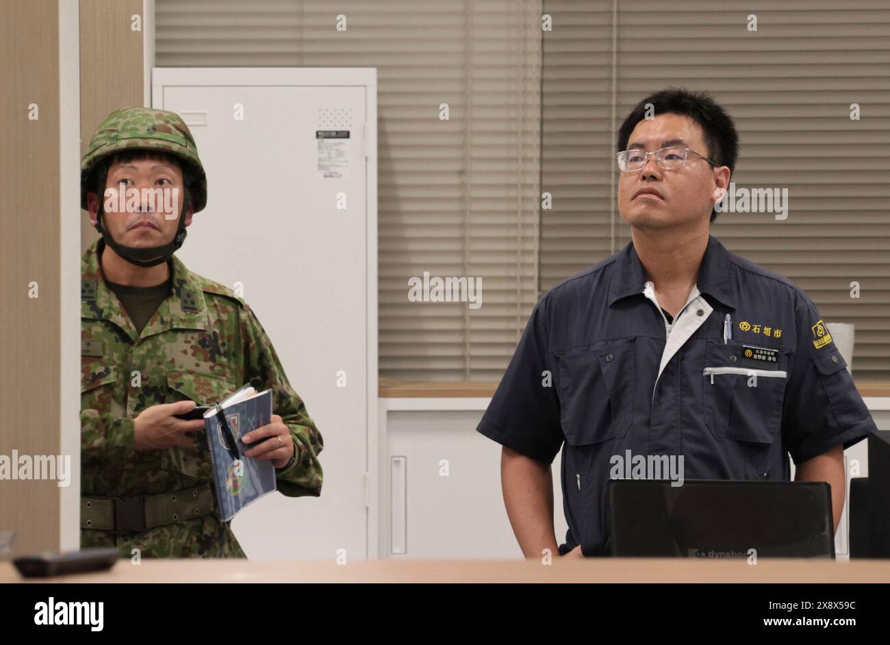 Members of Japan Self Defense Forces and staffs of Ishigaki City ...