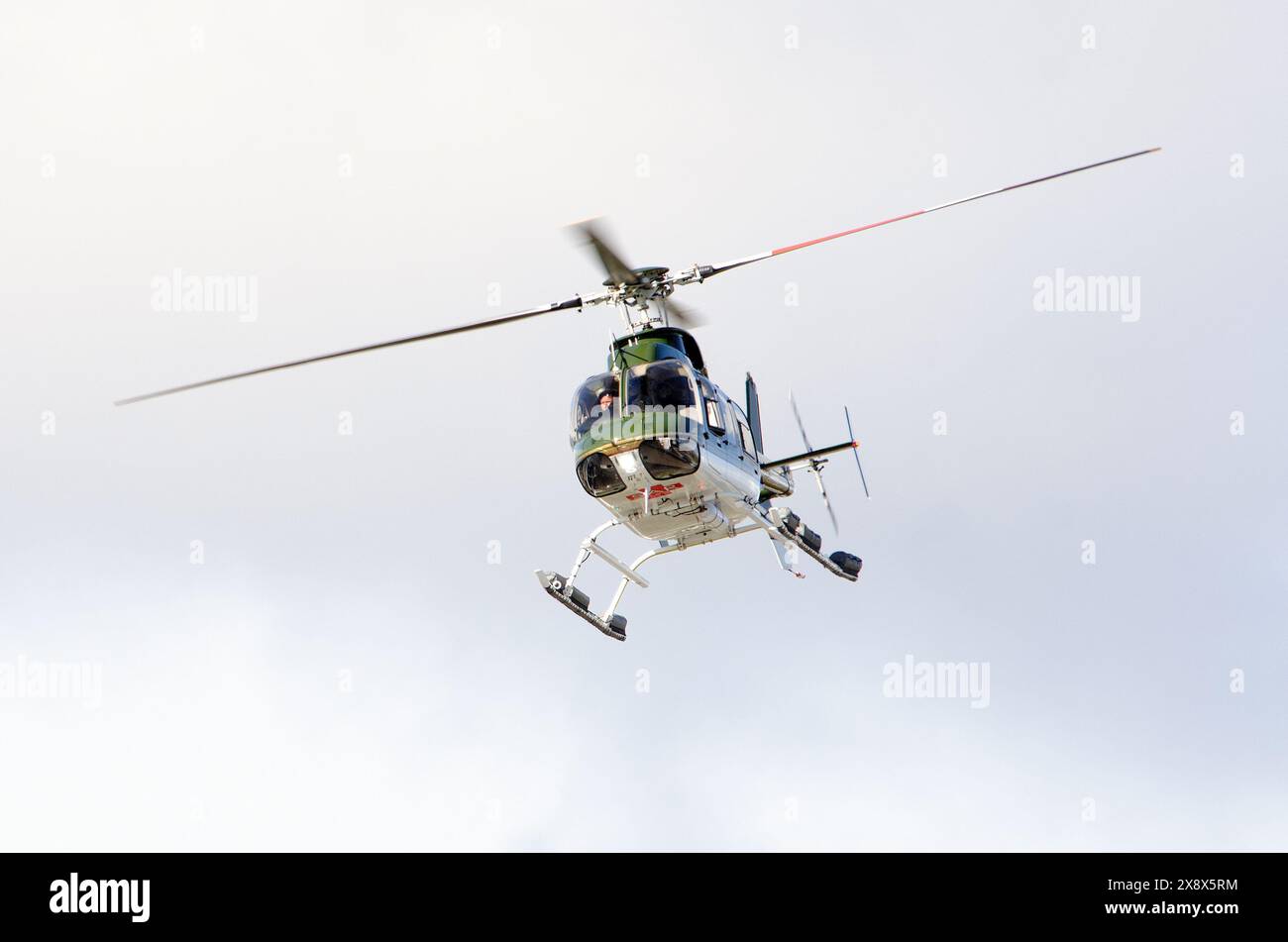 Exclusive Harrison Ford stands on his helicopter during a serious check ...