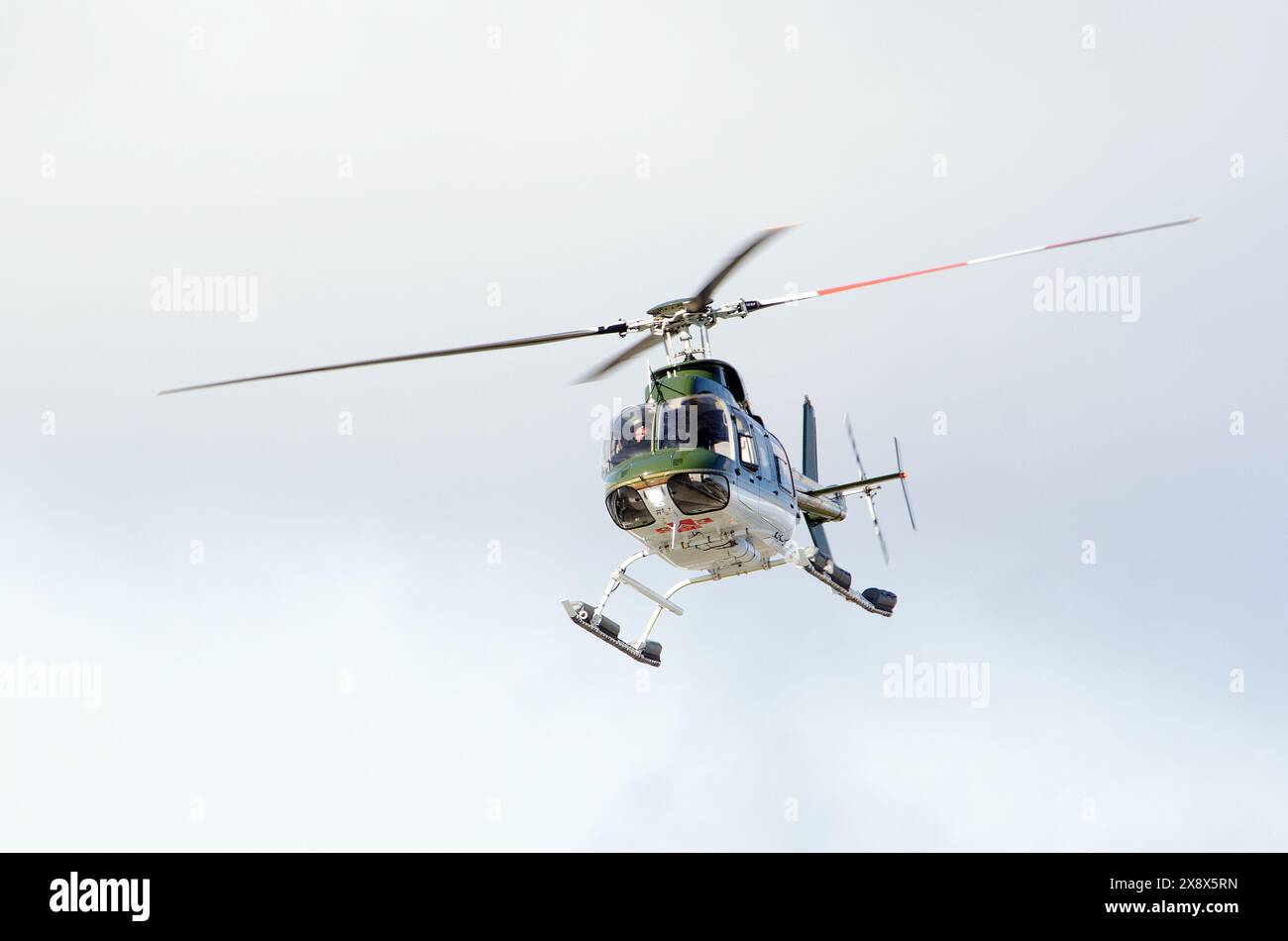 Exclusive Harrison Ford stands on his helicopter during a serious check ...