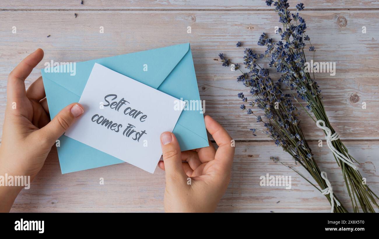 SELF CARE COMES FIRST text on supportive message paper note reminder ...