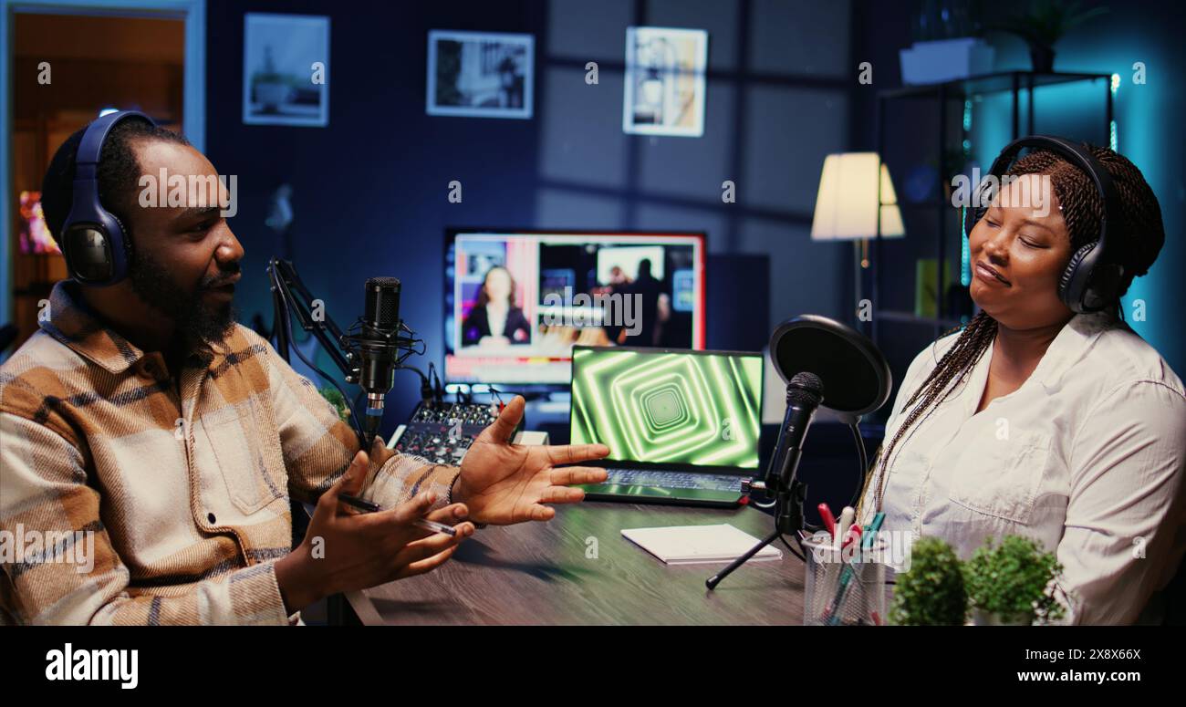 African american host engaging in entertaining discussion with ...