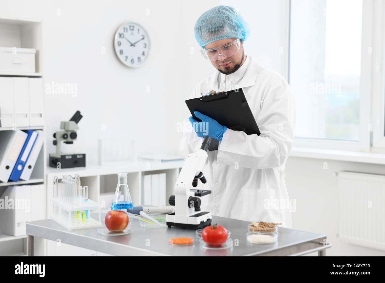 Quality control. Food inspector checking safety of products in ...