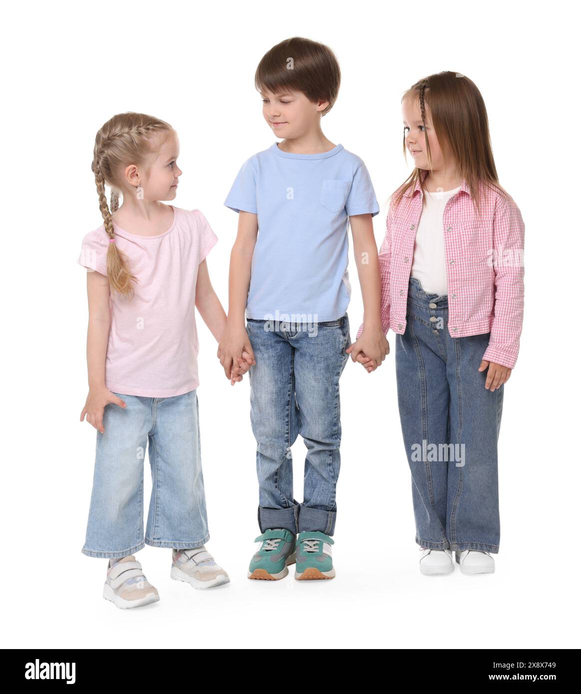 Group of cute children holding hands on white background Stock Photo ...