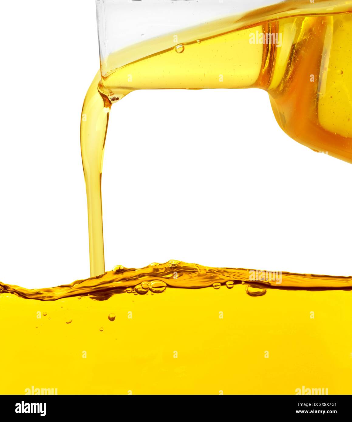 Pouring cooking oil from jug on white background, closeup Stock Photo ...
