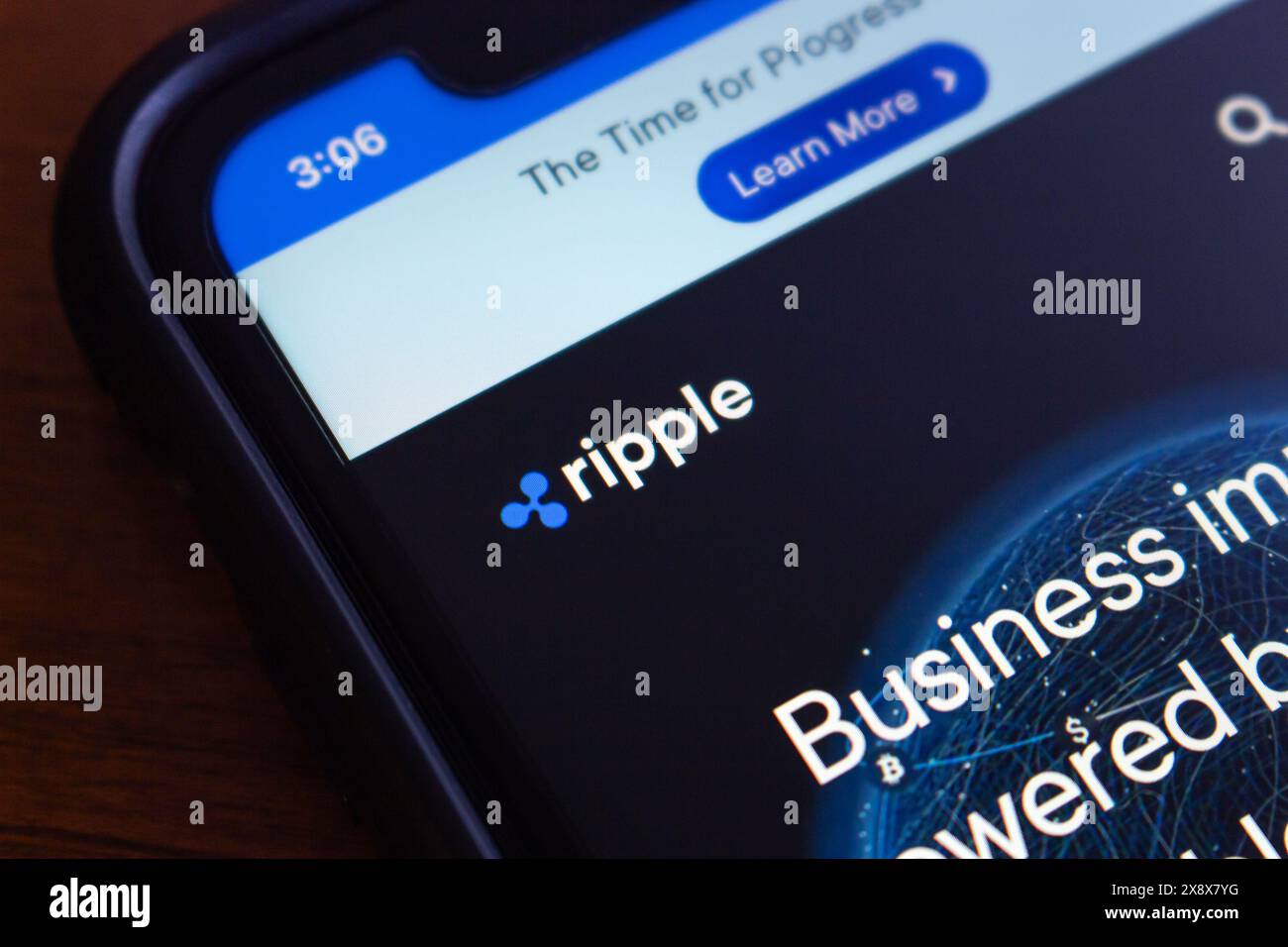 Logo of Ripple seen in an iPhone. Ripple (XRP) is a digital payment ...