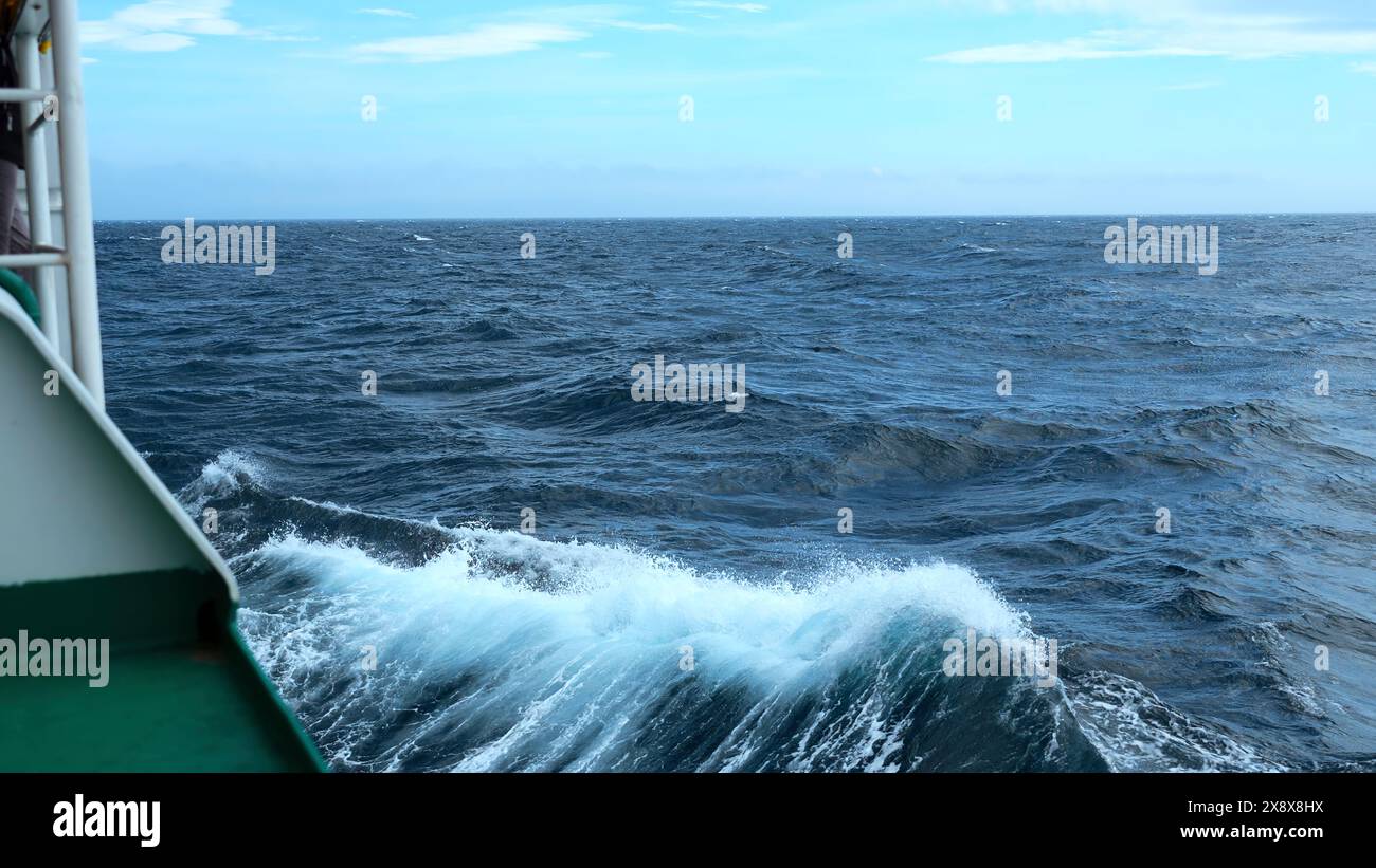 Waves from floating sea vessel. Clip. Beautiful moving waves from ...