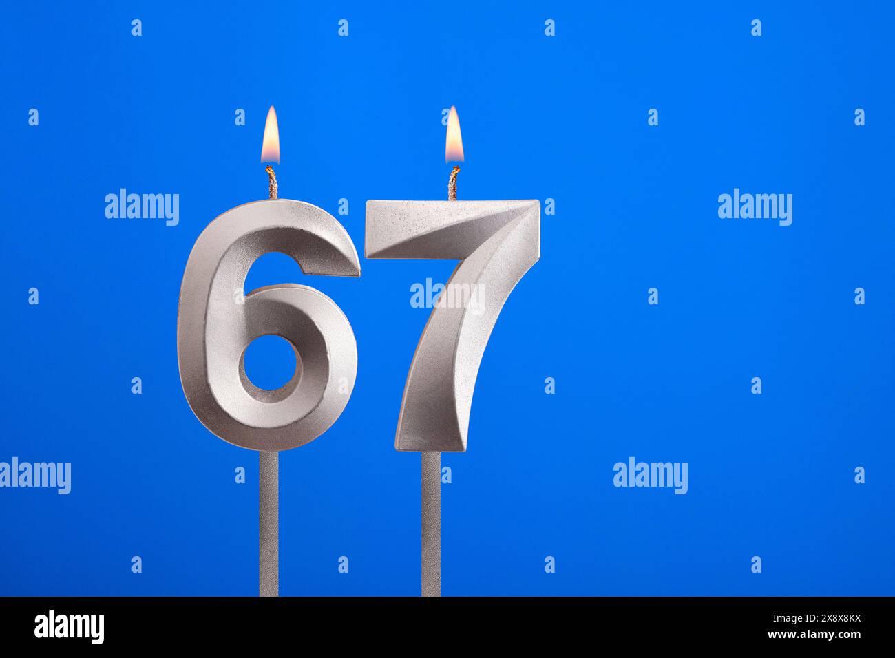 Birthday candle number 67 - Celebration card on blue background Stock ...