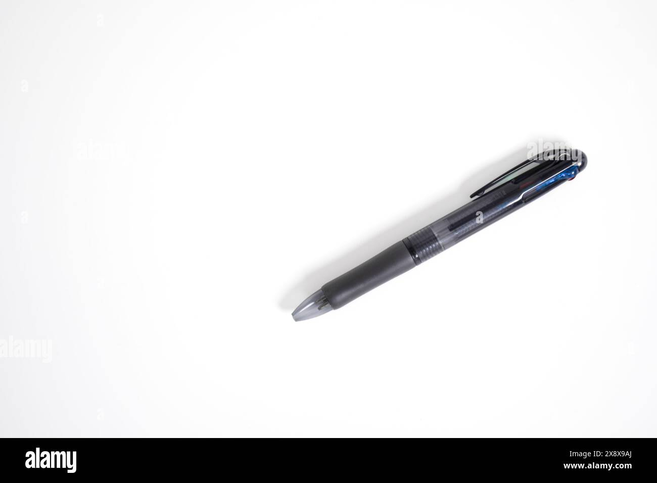 four color ballpoint pen isolated on white background. Pen with four ...