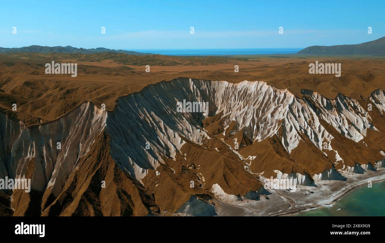 Aerial view of yellow grass field and beautiful rock formations. Clip ...
