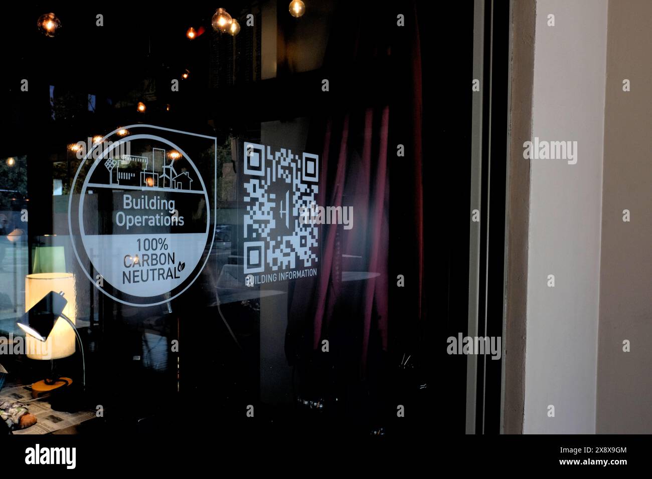 Window decal displaying 100% Carbon Neutral building operations ...