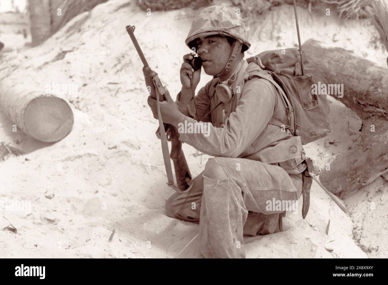 U.S. Marine Corps Navajo code talker communicating by walkie-talkie in ...