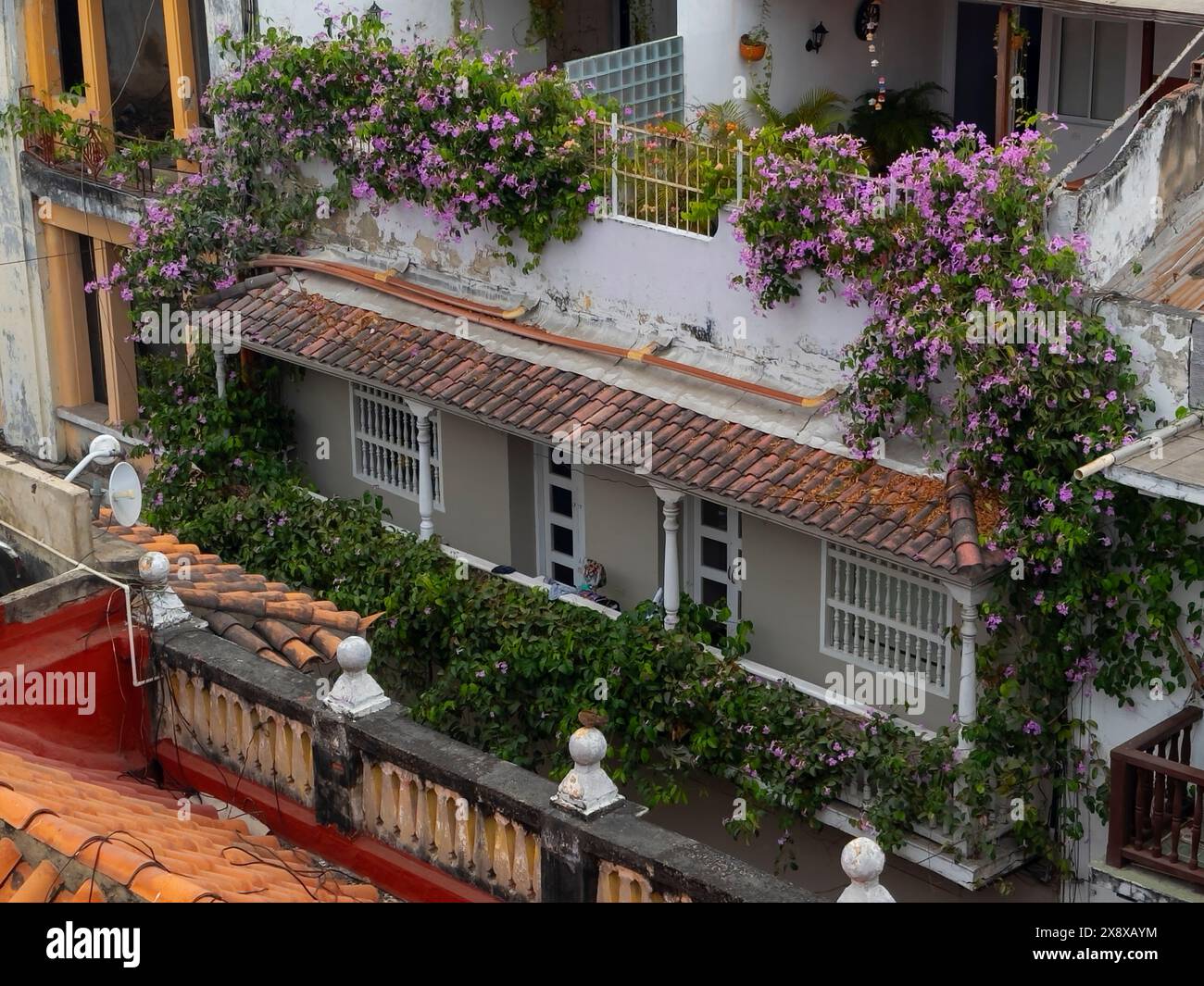 Traditional building with balconies in the historic walled city of ...