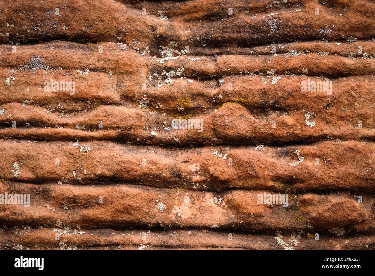 Multiple layers of eroded and striated sandstone Stock Photo - Alamy